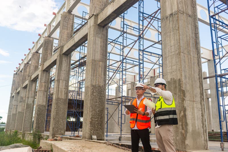 Architects Engineer are Checking the Progress of the Building Project ...