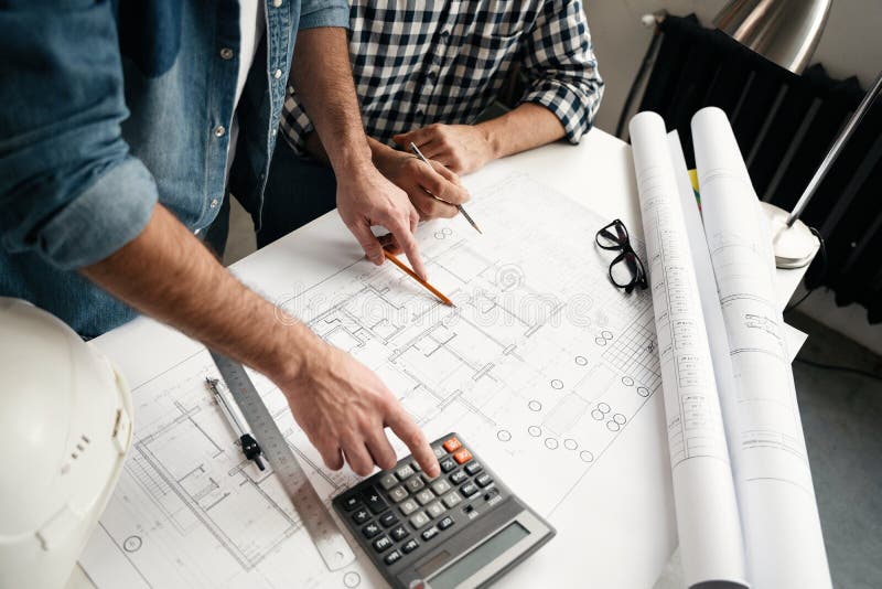 Engineer Drawing Plan on Blue Print with Architect Equipment ...