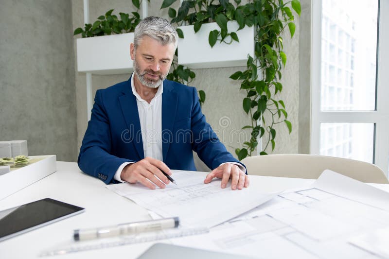 Architects or Engineer Working with Blueprint and House Model in the ...