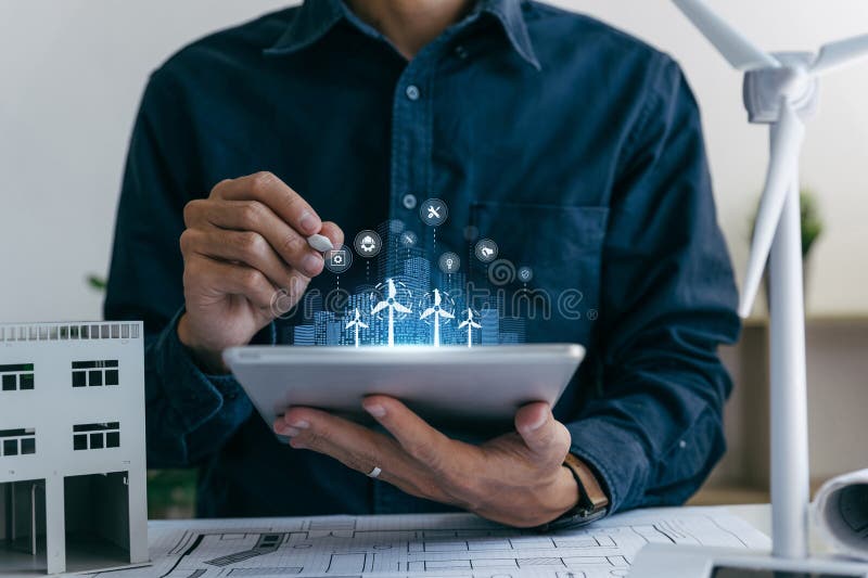 Architects Engineer Working on Tablet with Windmills, Designing Model ...