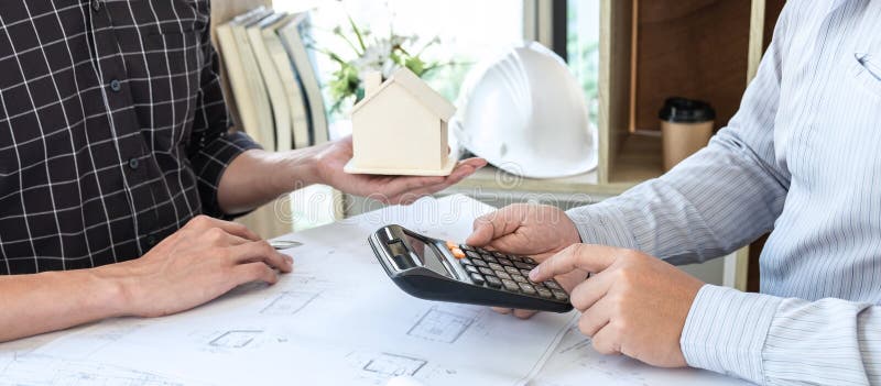 Architects or Engineering Team Consulting and Analyzing Working on ...