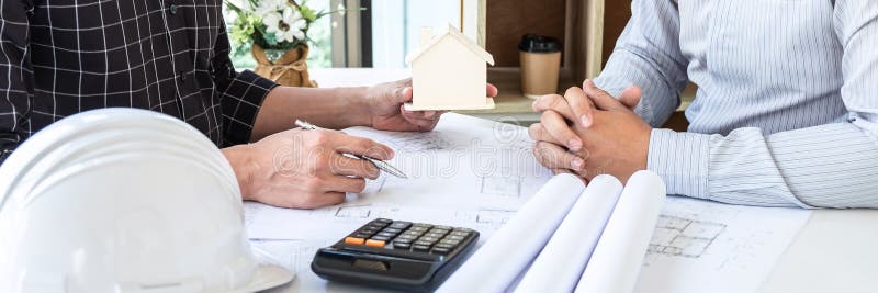 Architects or Engineering Team Consulting and Analyzing Working on ...