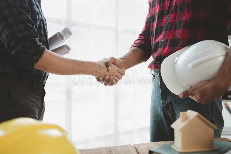 Architects and Engineers Agree on Blueprints Together, an Agreement is ...
