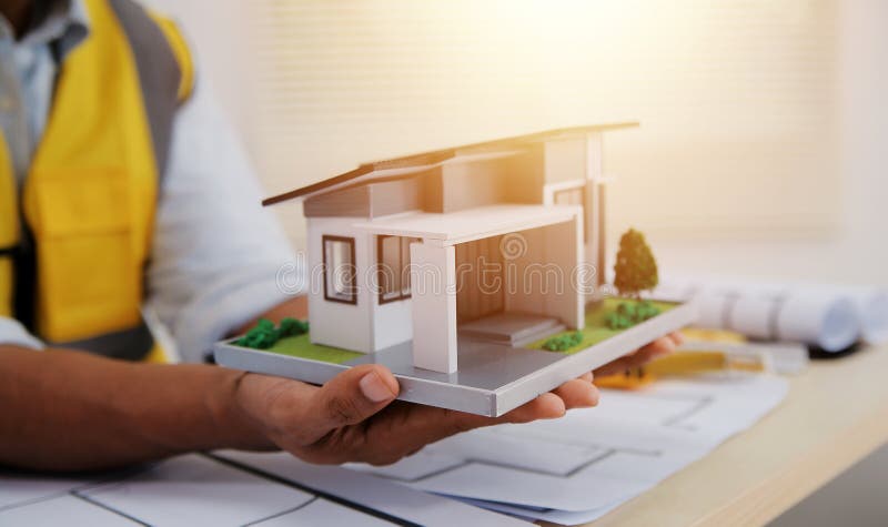 Architects, Engineers, Contractors Working in the Office with Blueprints, Inspection Engineers ...