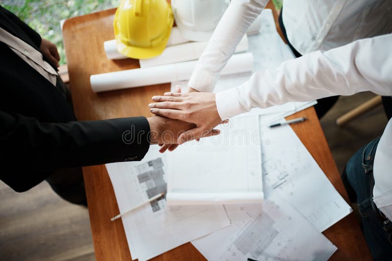 Architects and Engineers Teamwork Join Hands Together,construction ...