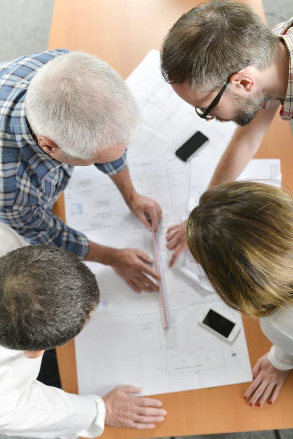 Architects in Group Meeting Stock Image - Image of confident, design ...