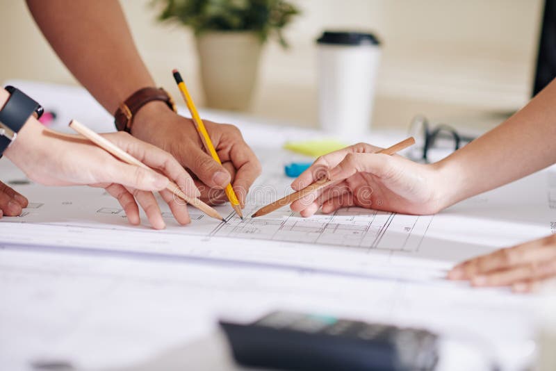 Architects Pointing at Blueprint Stock Image - Image of professional ...