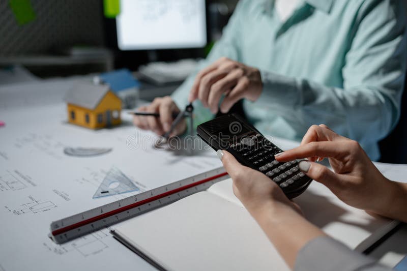 Architects are Reviewing Plans Together, Construction and Structure of ...