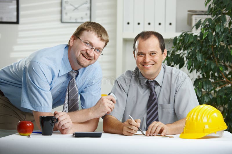 Architects Talking at Office Stock Photo - Image of explaining, adult ...