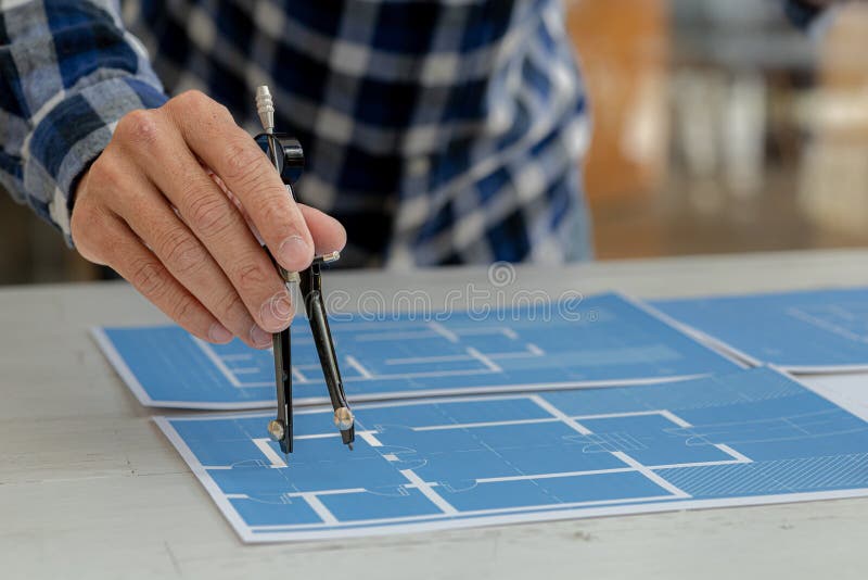 Architects Use Compasses To Draw on Building Plans for Editing ...