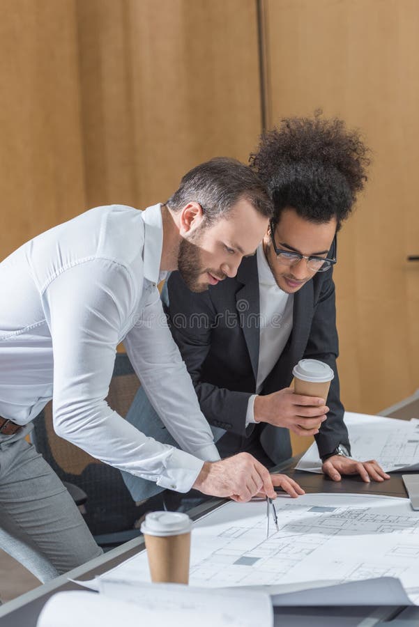 Architects Using Compass for Building Plans Stock Photo - Image of ...