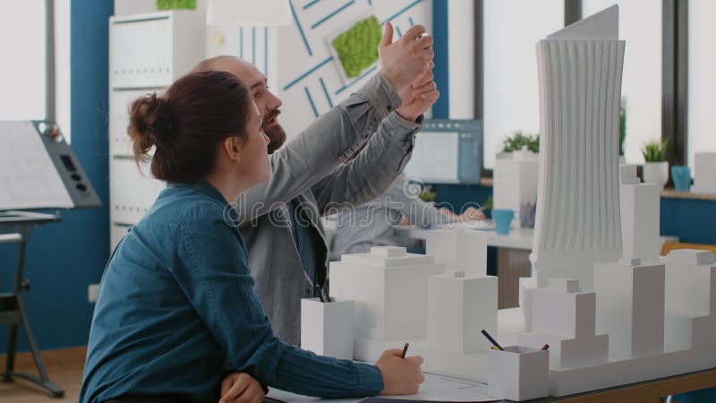 Architects Using Smartphone To Design Construction Layout with Building ...