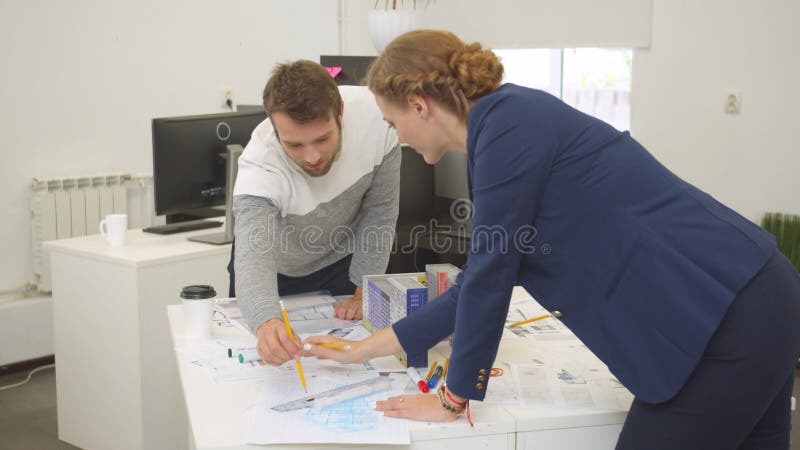 Architects Work with Drawings of Houses in the Office Stock Photo ...