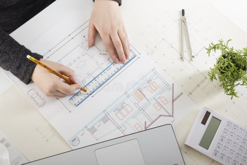 Architects Working on Blueprint, Real Estate Project. Architect ... Architects Working on Blueprint, Real Estate Project. Architect ...