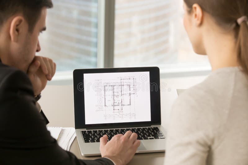 Architects Working with Building Plan on Laptop Screen, Close Up Stock ...