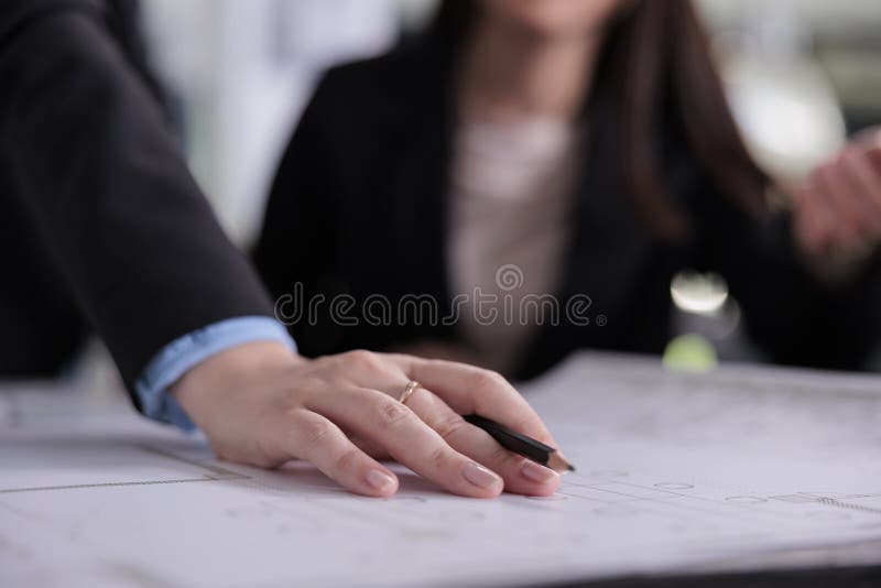 Architects Working on Cad Project, Hand on Blueprint Closeup Stock ... Architects Working on Cad Project, Hand on Blueprint Closeup Stock ...