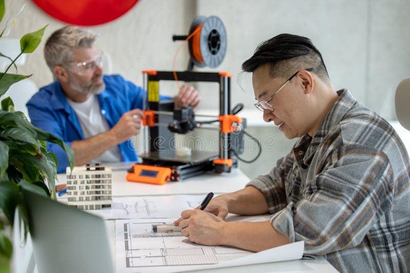 Architects Working with 3D Printer and Projecting House Model, Drawing ...