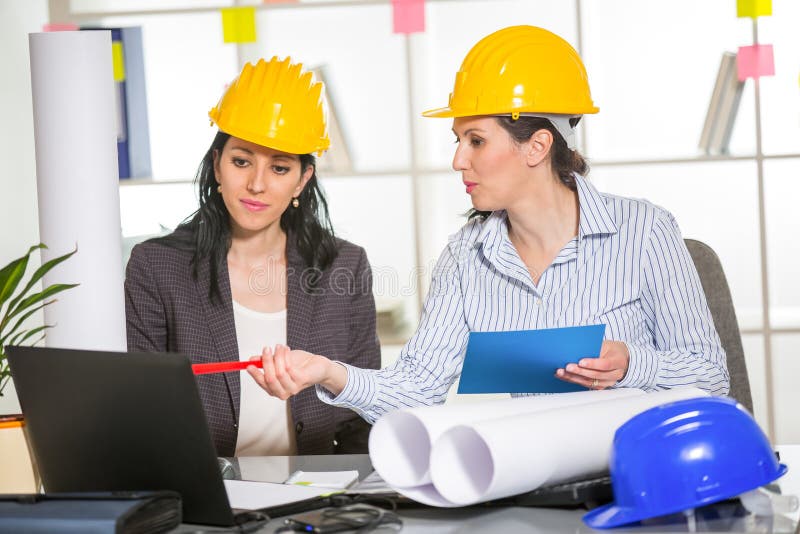 Architects Working in Office on Construction Project. Stock Image ...