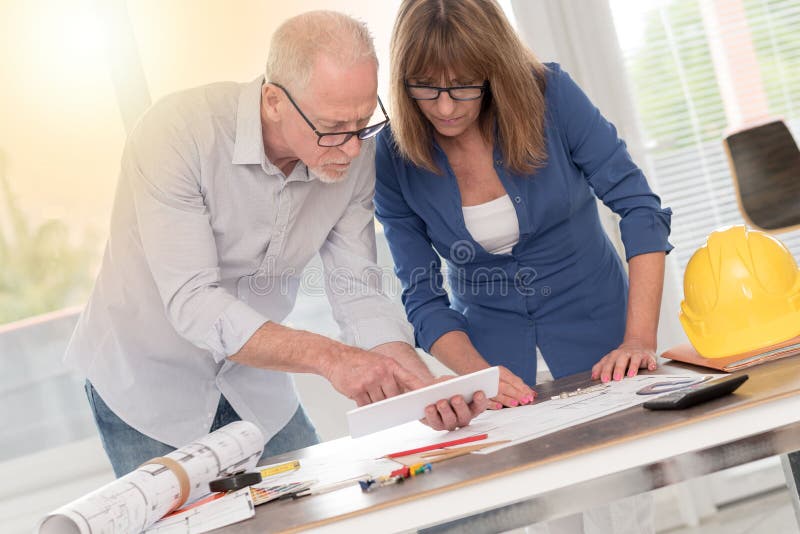 Architects Working on Plans, Light Effect Stock Image - Image of plans ...