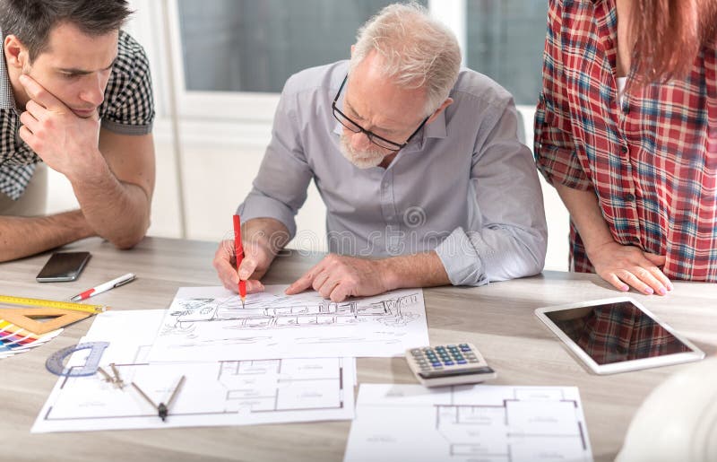 Architects Working on Plans Stock Photo - Image of engineer, paper ...