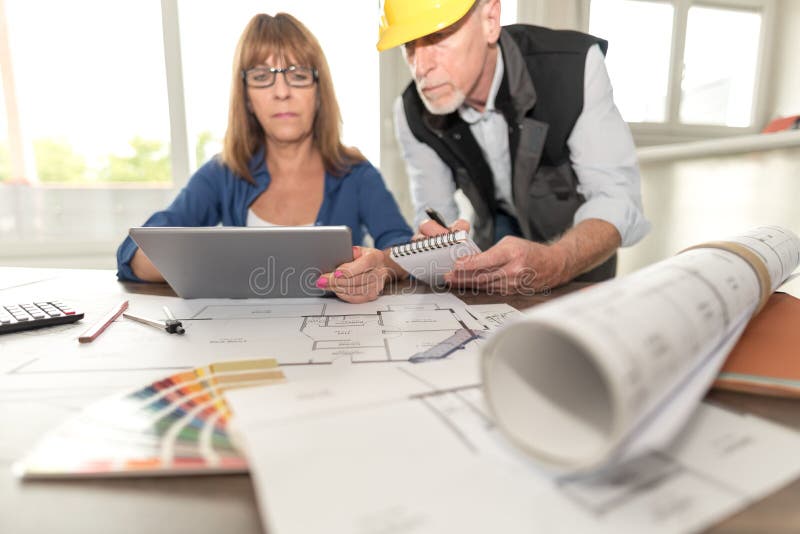 Architects Working on Plans Stock Photo - Image of plans, professional ...