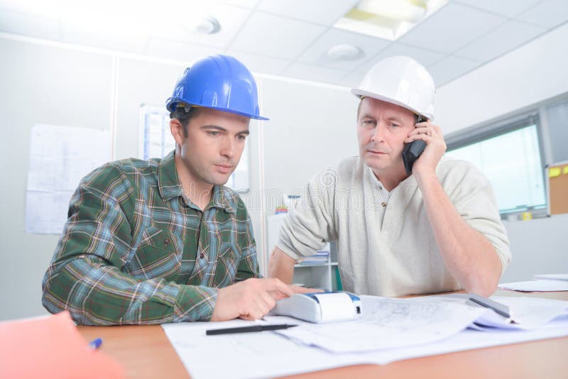 Architects Working Working Together Stock Image - Image of blueprints ...