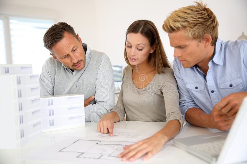 Architects Working Together on Big Project Stock Photo - Image of women ...
