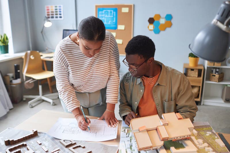 Architects Workng with Blueprint in Team Stock Image - Image of ...