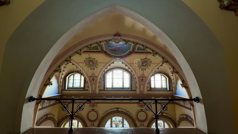 The Architectural Beauty of Arched Windows and a Decorative Ceiling ...