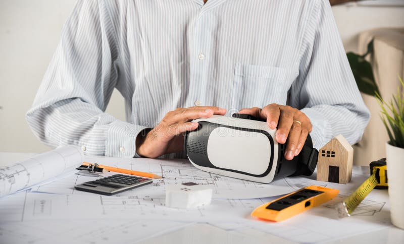 Architectural Building Design Holding 3D VR Glasses and Construction ...