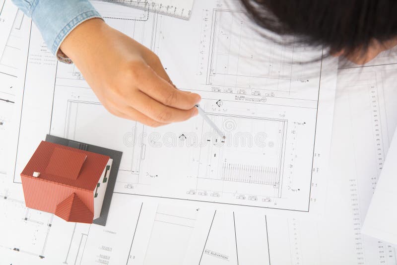 Architectural Design Engineers Check Construction Drawings through ...