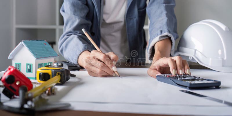 Architectural Engineer Designing Construction Plans with Calculation ...