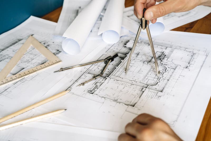 Architectural Engineering Design Plan Drawing on the Table. Architect ...