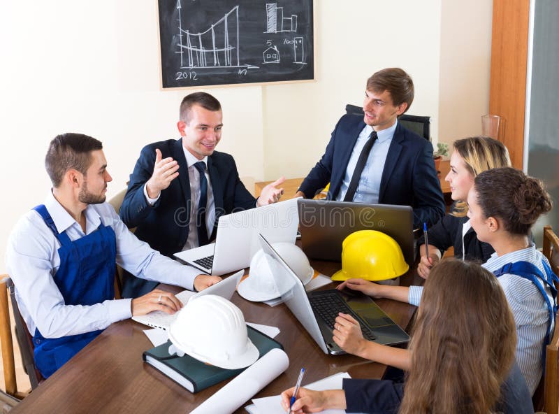 Architectural Engineers Discussing Business Project Stock Photo - Image ...
