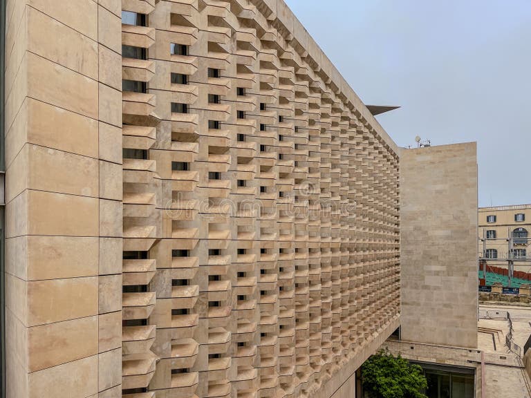 Architectural Facade with Geometric Stone Patterns Creating Depth and ...