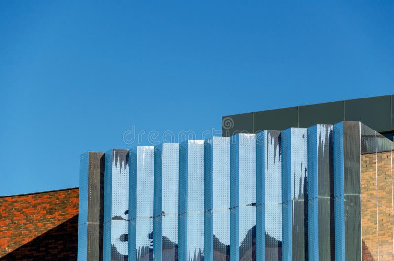 Modern Architectural Structure Featuring Geometric Facade Reflective ...