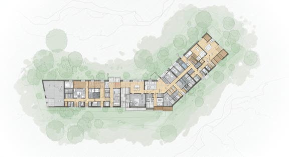 Architectural Floor Plan of a Building with Two Angled Wings Surrounded ...