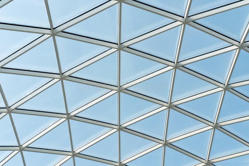 Architectural Glass Structure with a Geometric Triangular Pattern on a ...