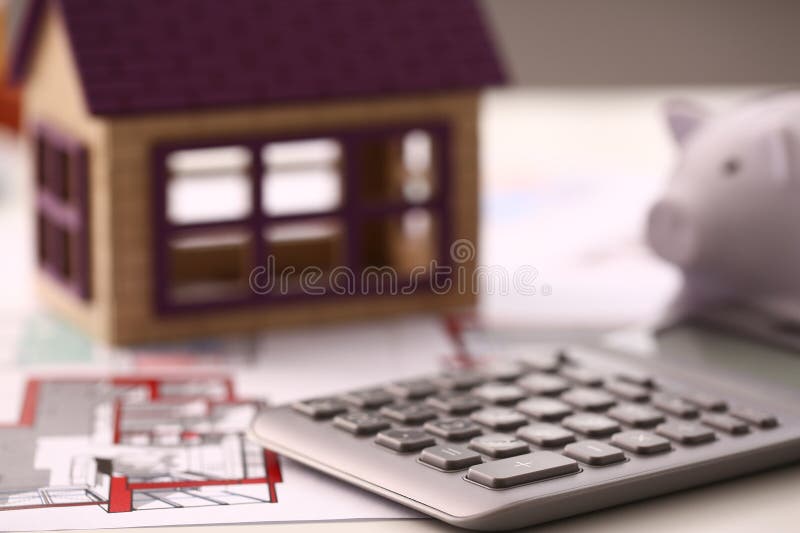 Architectural House Plan House Layout and Calculator on Table Stock ...