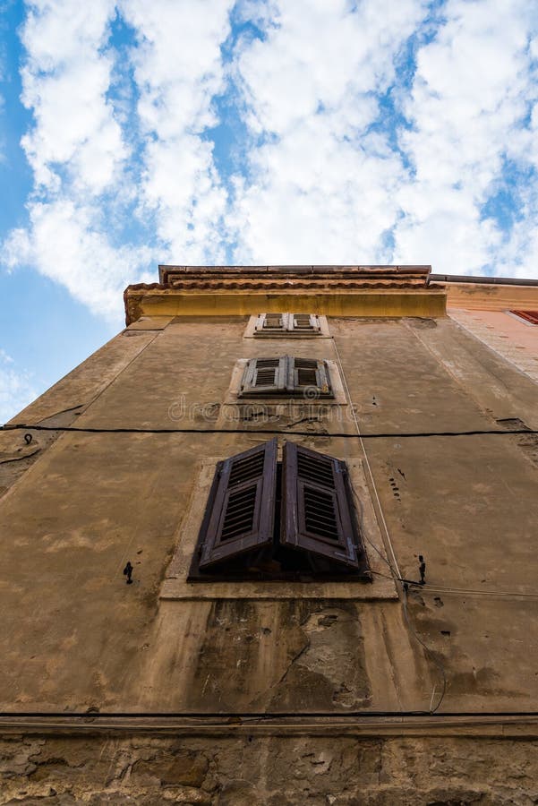 Architectural Look at the House from the Bottom Up with Cloudy Sky on ...
