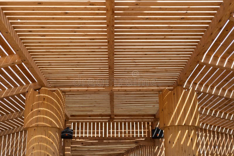 Architectural Pattern of Wooden Slats Creating Symmetrical Shadows and ...