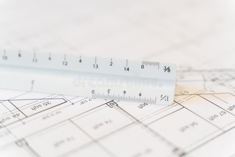 Architectural Scale Ruler with Paper Blueprints Plans for New Building ...