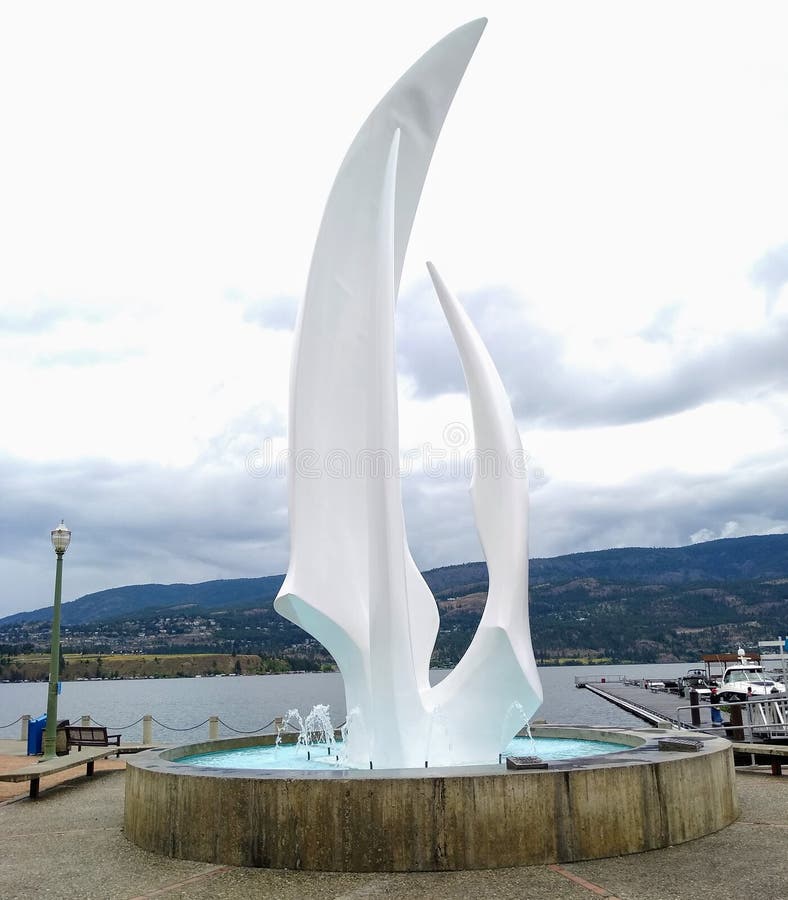 An Architectural Structure in the Form of White, Curved, Tall Elements ...