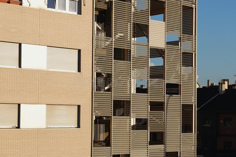 An Architectural Structure Showcases a Series of Open Grid Panels ...
