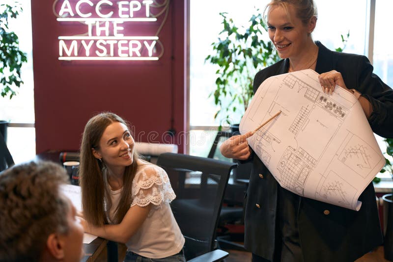 Architectural Team Discussing Site Development Plan in Workplace Stock ...