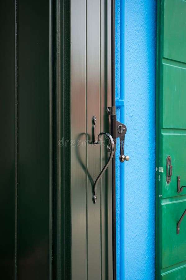 Architecture Background of Open Doors with Door Handle Forming Heart ...