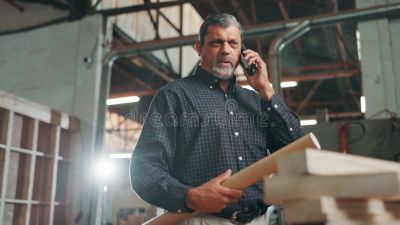 Men, Architecture and Blueprint for Discussion in Warehouse, Collaboration and Planning for ...