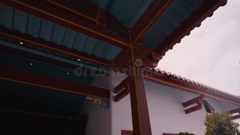 The Architecture of a Chinese Monastery with a Red Rooftop and a White ...