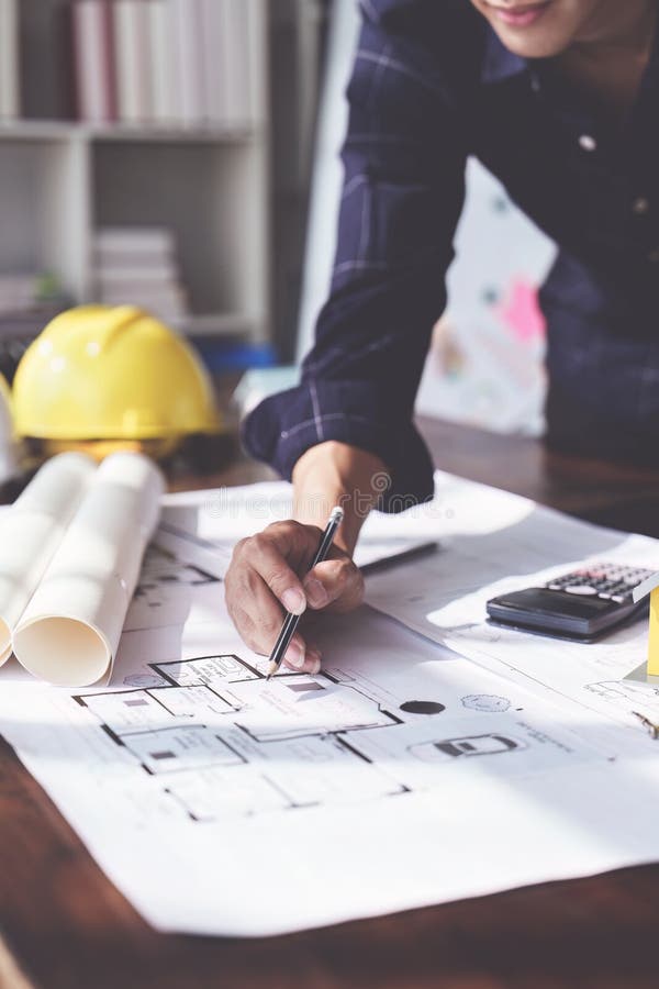 Architecture or Civil Engineer Analyze with Construction Blueprint ...