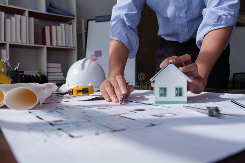 Architecture or Civil Engineer Analyze with Construction Blueprint ...